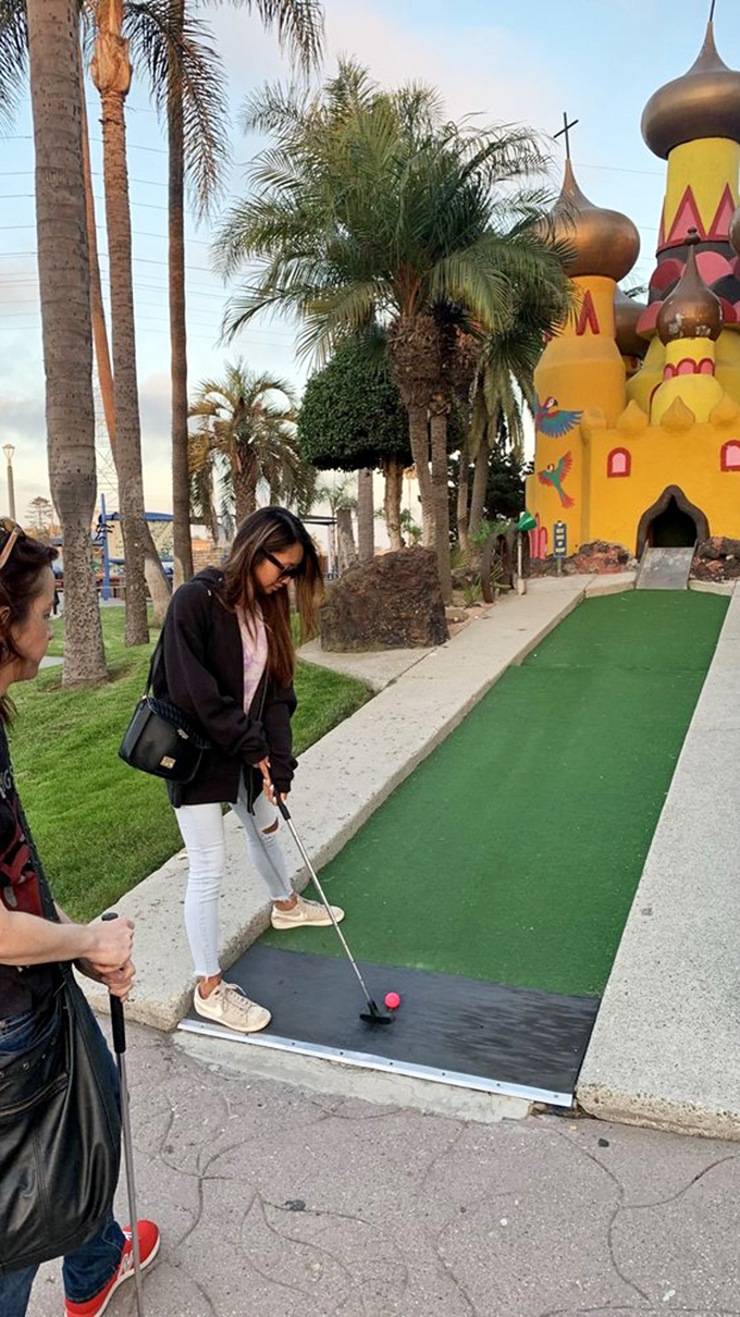 Concentration is key! These golfers are so focused, you'd think they were diffusing a bomb instead of sinking a putt.