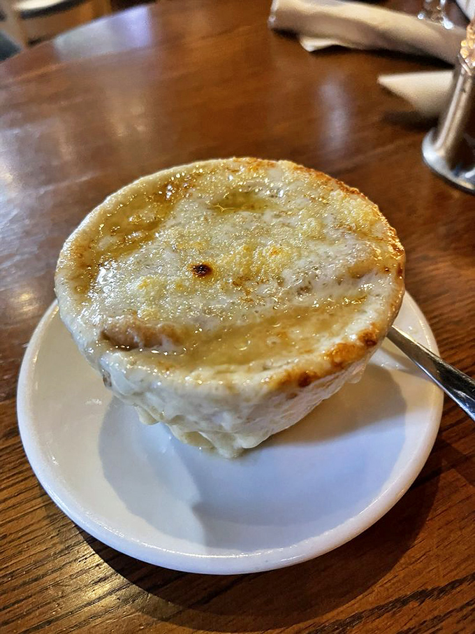 This isn't just soup, it's a warm hug in a bowl. Baked French Onion Soup so good, it'll make you want to send a thank-you note to whoever invented cheese.