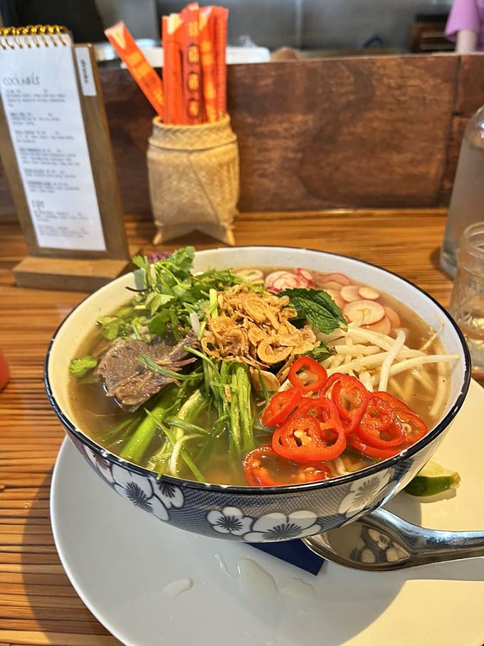 Pho-nomenal flavors! This steaming bowl of goodness is like a choose-your-own-adventure novel. Each spoonful tells a different, delicious story.
