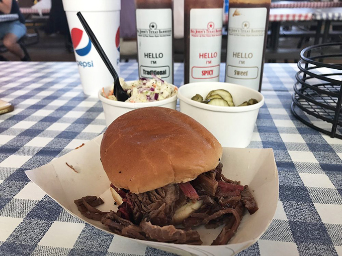 The brisket sandwich: Where bread becomes a mere vehicle for delivering smoky, beefy goodness to your face.