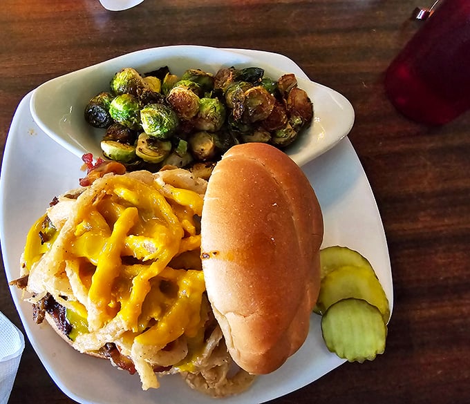 A burger that's dressed to impress! Topped with enough gooey cheese to make a Wisconsinite weep with joy.