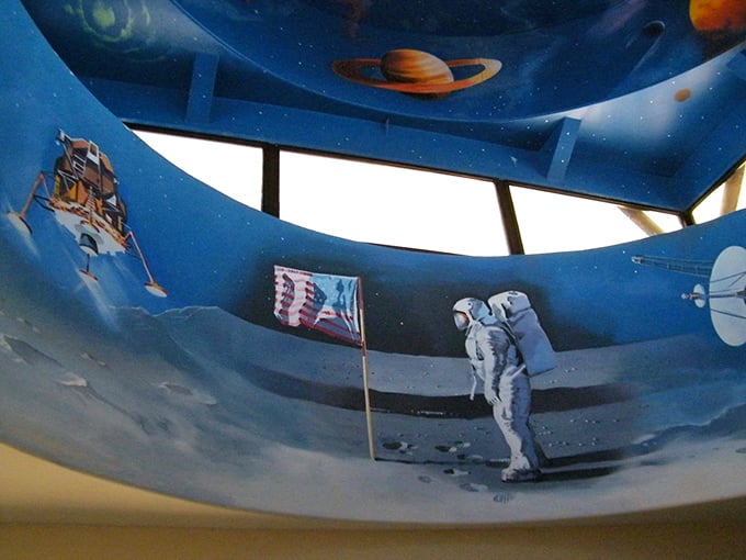 Look up and blast off into a painted galaxy! This ceiling mural turns every meal into a space walk, minus the zero-gravity queasiness.