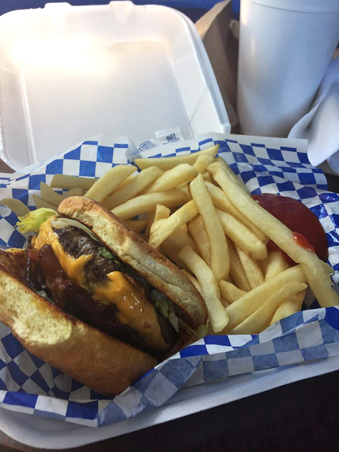 "Burger bliss achieved! This cheese-draped beauty and its crispy sidekick are here to remind you why sometimes, simple is simply perfect."