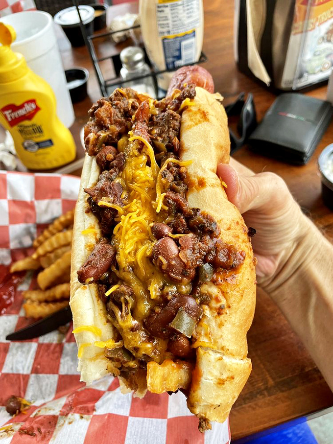 This isn't just a chili dog; it's a flavor fiesta in a bun! Warning: may cause spontaneous yodeling of "Chili Con Carne."