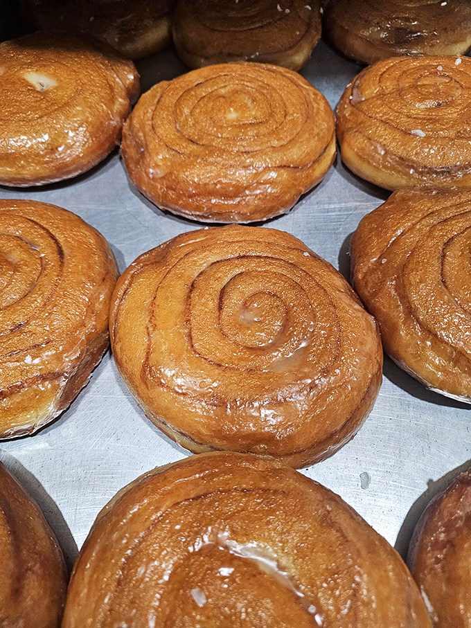 Spiral into deliciousness! These cinnamon rolls are so hypnotizing, you might forget your own name. But who needs a name when you have pastry?