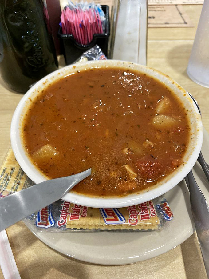 A bowl of coastal comfort! This Minorcan clam chowder is like a warm hug from the ocean, with a spicy kick to keep things interesting.