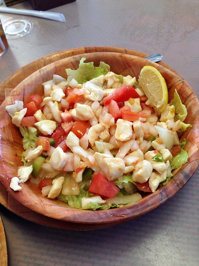 A conch salad so fresh, it might start singing "Under the Sea." This vibrant dish is a Caribbean vacation for your taste buds.