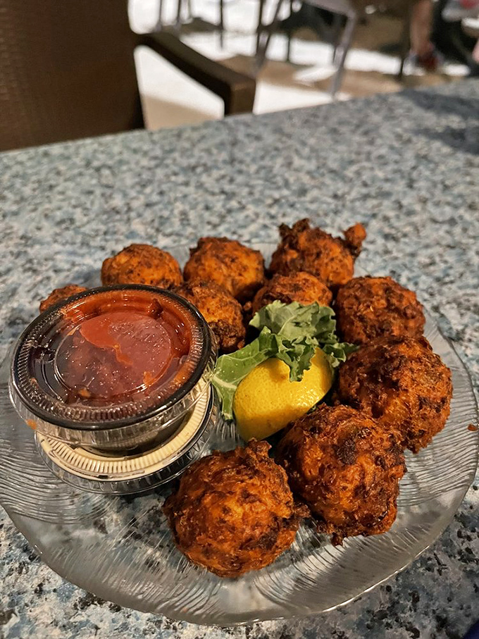 Conch fritters: The Keys' answer to popcorn chicken. These golden nuggets are crunchier than your old mix tapes and twice as addictive.