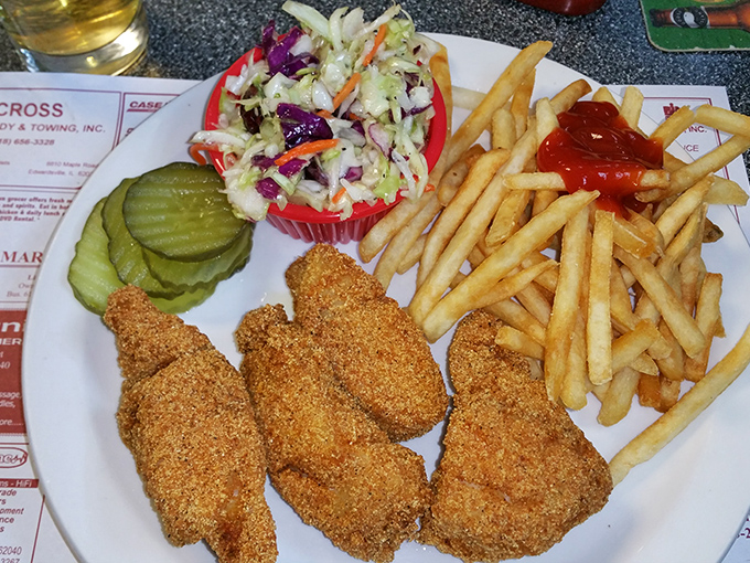 Fish so crispy, it could star in its own ASMR video. Paired with fries and slaw, it's a sea-to-plate sensation.
