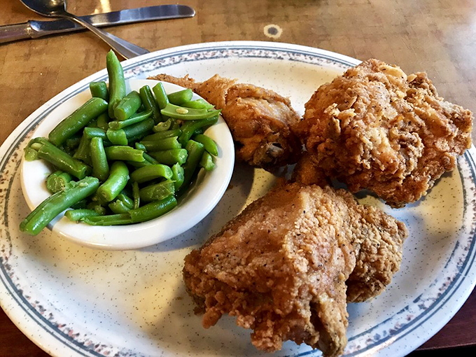 Fried chicken so crispy, it could make Colonel Sanders hand over his secret recipe. Paired with green beans for "balance."