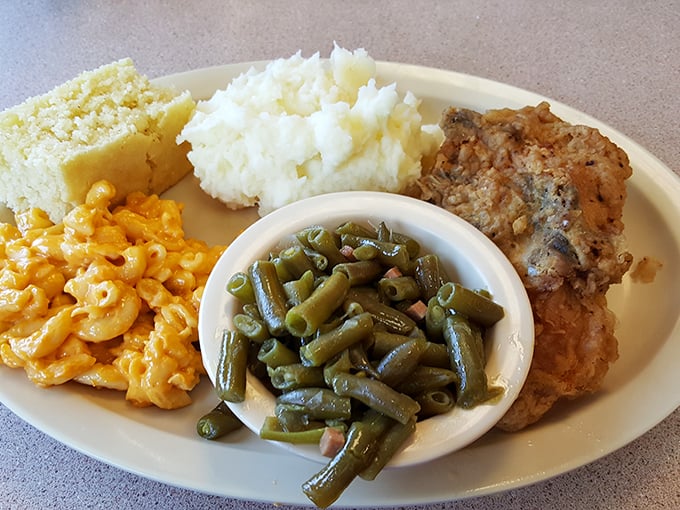 A Southern feast fit for royalty! This fried chicken meal has more sides than a geometry textbook, and each one's a winner.