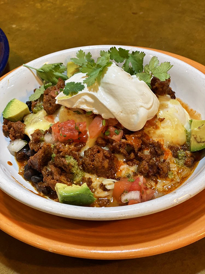 Huevos Rancheros: Where breakfast meets fiesta! A plate so vibrant, it might just salsa right off the table.