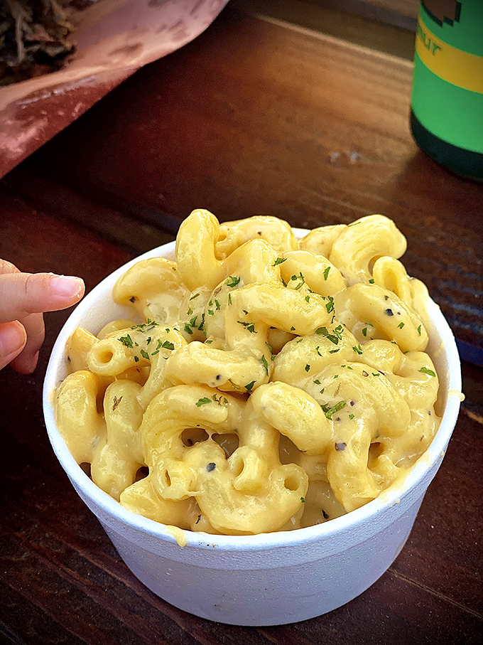 Mac and cheese that's cheesier than your uncle's jokes at Thanksgiving. This isn't a side dish; it's the main event's soulmate.