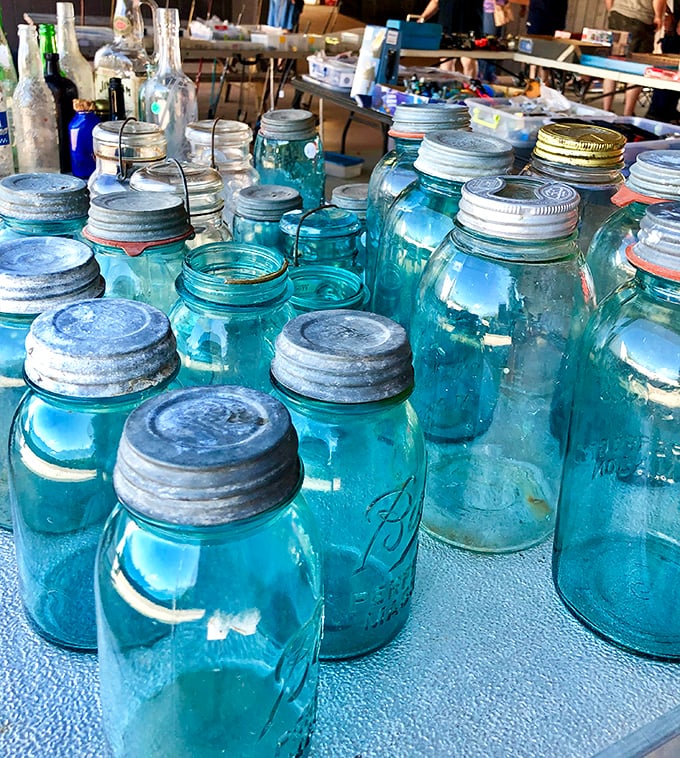 Mason jar madness! These blue beauties are ready to preserve your summer fruits or serve as quirky drinking glasses.