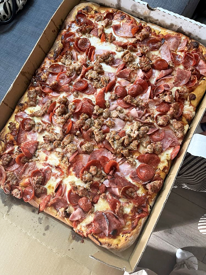 A meat lover's dream or a cardiologist's nightmare? Either way, this pizza is not for the faint of heart – but oh, what a way to go!
