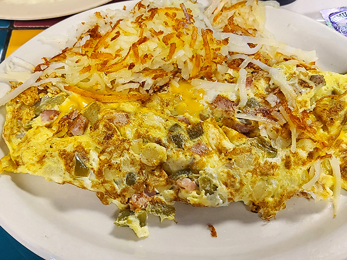 This omelet is so stuffed, it makes Mary Poppins' bag look minimalist. Prepare for an egg-cellent adventure!