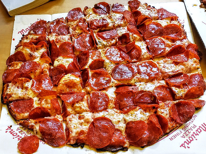 Pepperoni perfection! This pizza is so loaded, it's like a "Where's Waldo?" of meat &ndash; can you spot any crust under all that goodness?