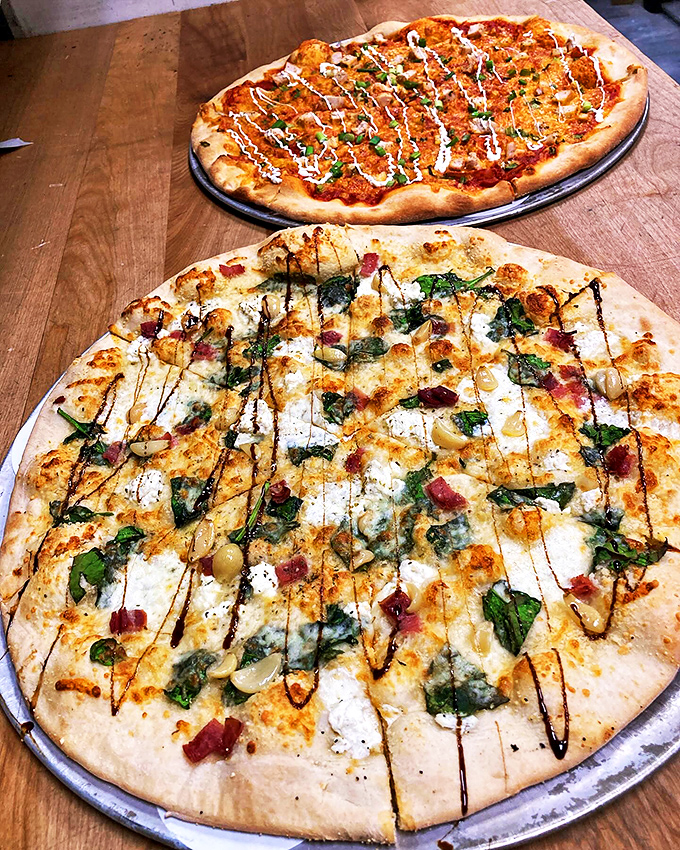 Pizza perfection that would make an Italian nonna weep with joy. These pies are so good, they might just solve world peace... one slice at a time.