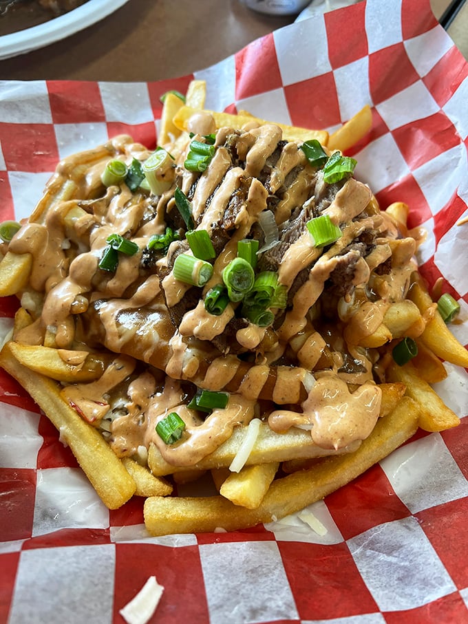 Poutine paradise! This Canadian-inspired dish is so good, you'll be saying "eh" in no time, brah.