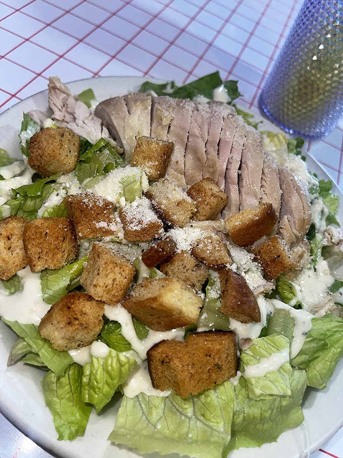 Who says you can't make friends with salad? This leafy masterpiece is proof that sometimes, it's hip to be square (meal).