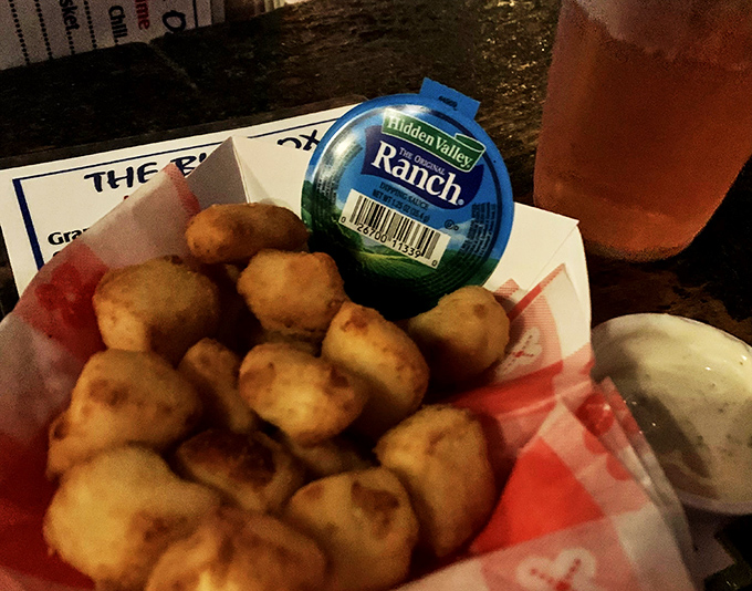 Cheese curds: Wisconsin's gift to the world! These golden nuggets are so good, they should be the state's official currency.