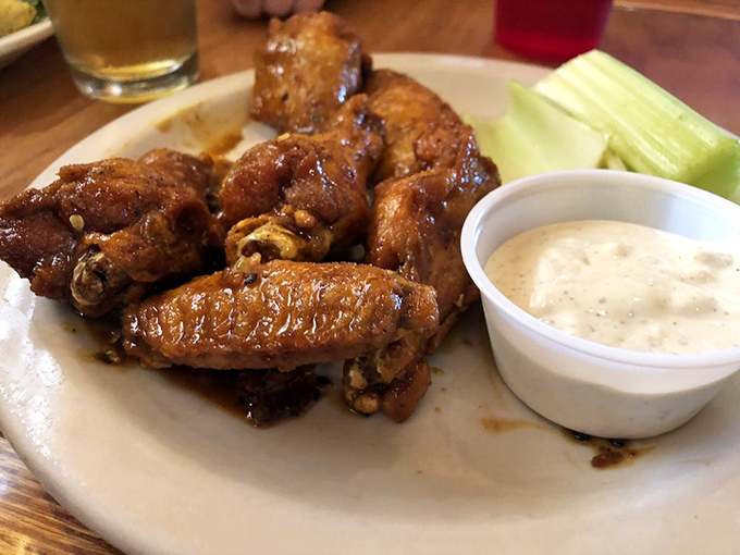 These wings are so perfectly glazed, they could moonlight as modern art. Delicious, finger-licking modern art.