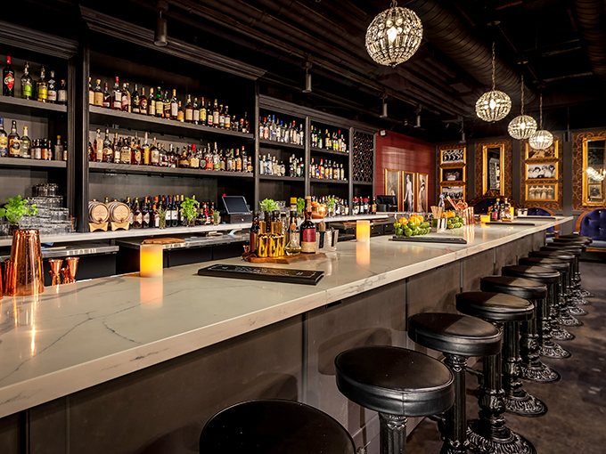 Pull up a stool and prepare for liftoff. This sleek bar counter is your mission control for an evening of spirited exploration.