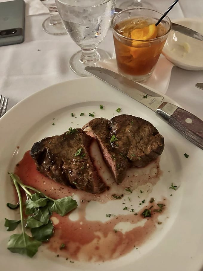 Mignon but mighty! This petite filet, nestled in a pool of savory jus, proves that sometimes the best things come in small, perfectly grilled packages.