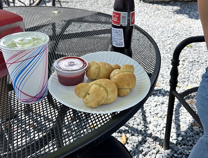 Garlic knots of glory! These golden nuggets are like edible hugs for your taste buds.