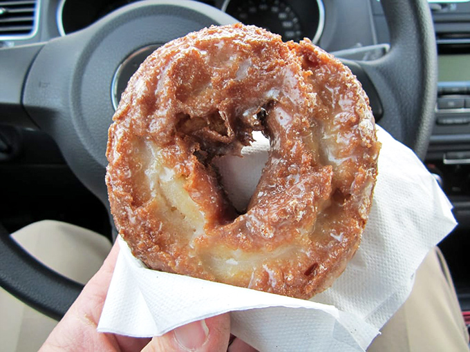 Autumn in a bite! This glazed apple cider donut captures the essence of fall, no leaf-peeping required.