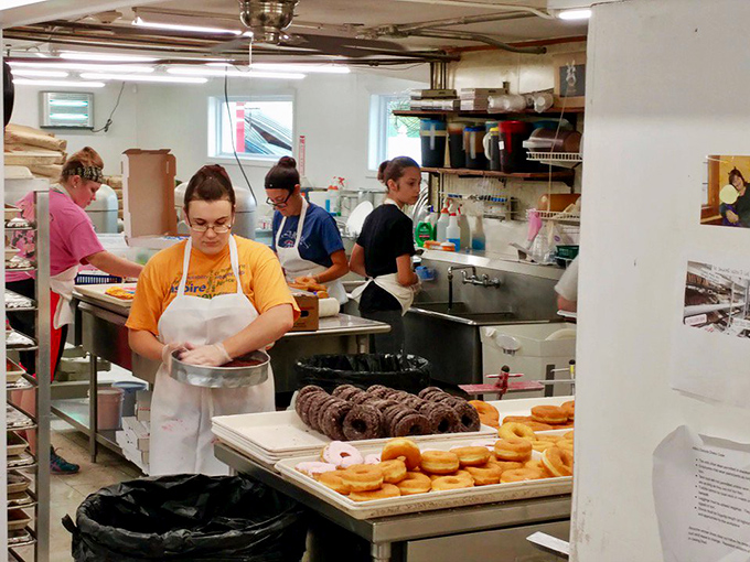 Behind the scenes of donut magic. These kitchen wizards are the unsung heroes of your sugar high.