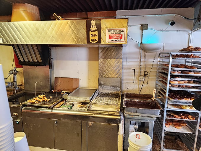 Where the magic happens! Bob's compact kitchen is like Santa's workshop, but instead of toys, it's churning out sugary joy.