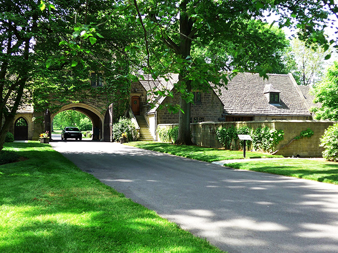 Driving through history! This archway looks like the perfect spot for a dramatic reveal in a period drama or a classic car commercial.