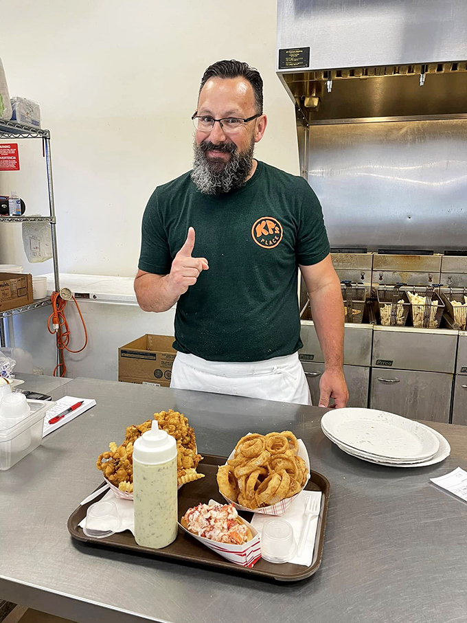 The maestro at work! KP's owner serves up smiles and satisfaction with every plate. Now that's a thumbs up we can all agree on.