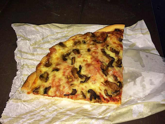 Pizza perfection! This slice looks so good, it might just convert a deep-dish devotee to the thin-crust camp.