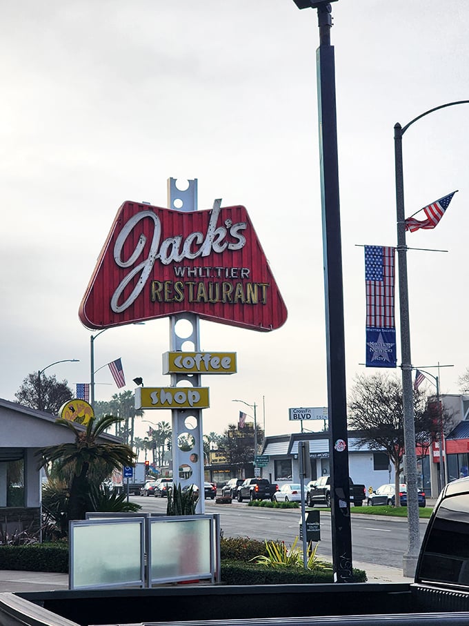 A sign that says "Welcome" in the universal language of good food. Jack's logo is like a bat signal for hungry heroes.