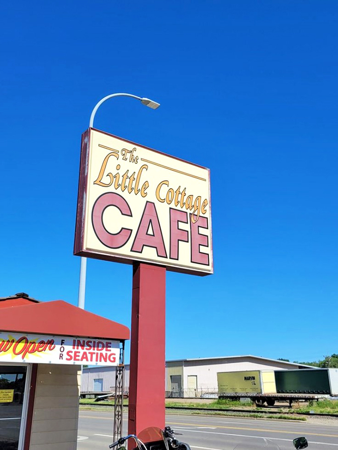 A beacon of hope for hungry travelers. This sign is like a lighthouse, guiding empty stomachs to safe harbor.