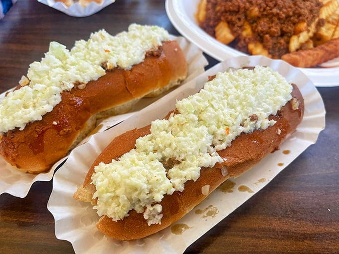 Slaw dogs: The rebellious cousin of the chili dog. It's like coleslaw and hot dog had a delicious, messy baby.