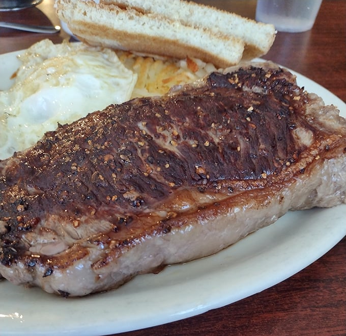Behold, the pièce de résistance! This steak is so perfectly cooked, it should come with its own round of applause. Fork and knife required, bib optional.