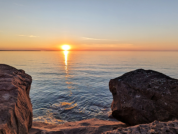 Nature's grand finale: The sun bids farewell in a blaze of glory, painting the sky and water in hues that would make Monet jealous.