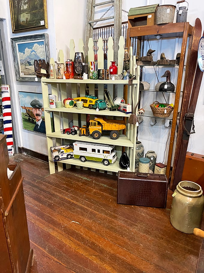 Toy story come to life! From dump trucks to decoys, this playful panorama is where childhood dreams park for the night.