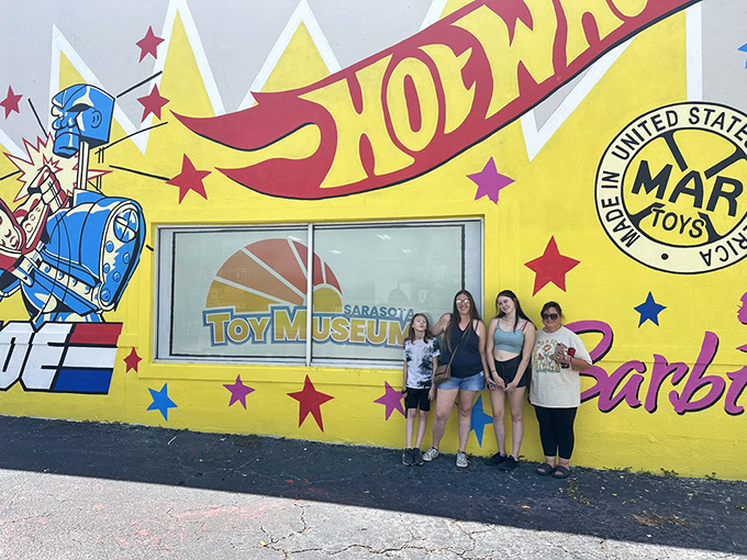 Say cheese to childhood memories! These happy visitors prove that you're never too old for a day at the toy museum.