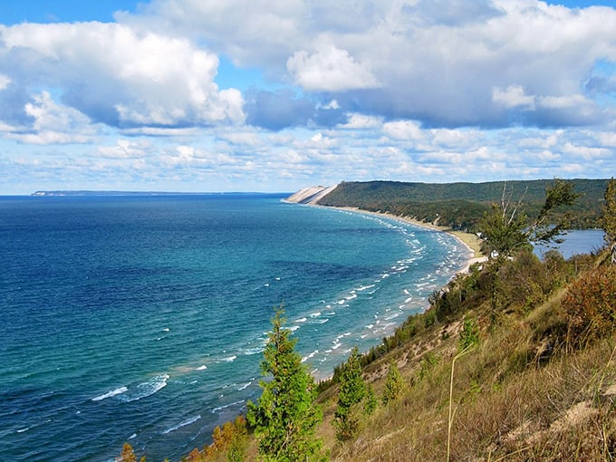 Empire's natural majesty! Where dunes meet lake in a landscape that'll leave you speechless.