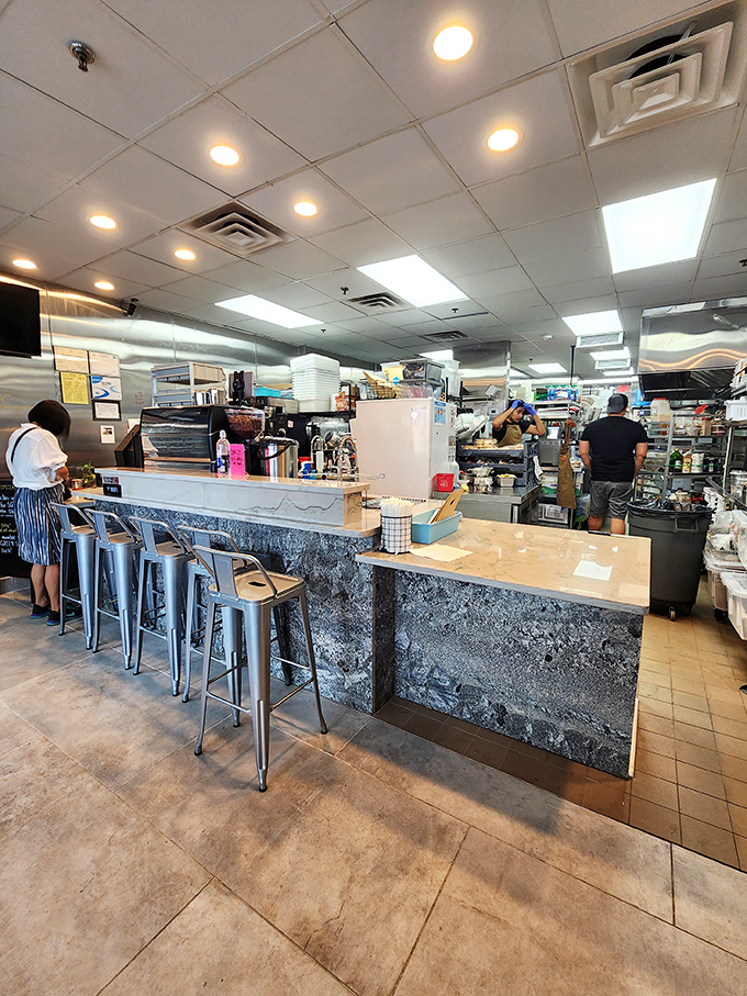 Where the magic happens! This kitchen is busier than Santa's workshop, but instead of toys, they're crafting edible joy.