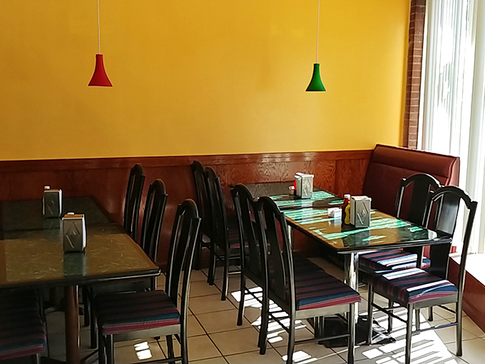 Cozy corner alert! Ruby Donut's dining area is the perfect spot to contemplate life's big questions – like "Should I have another donut?"