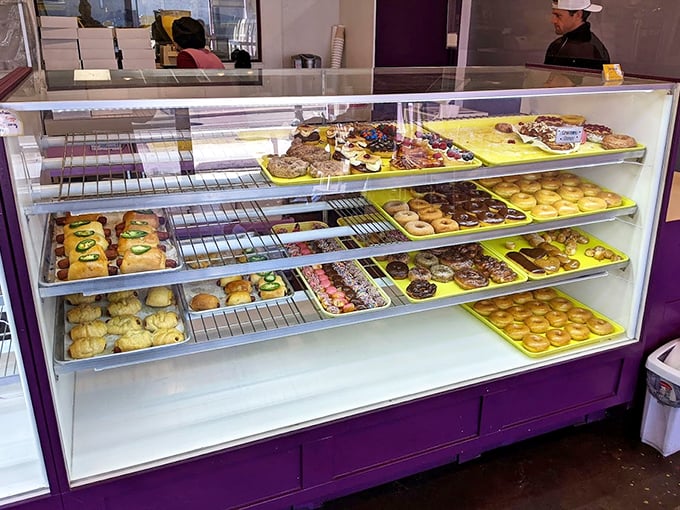 Decisions, decisions! This display case is like a treasure chest of fried gold. Good luck choosing just one!