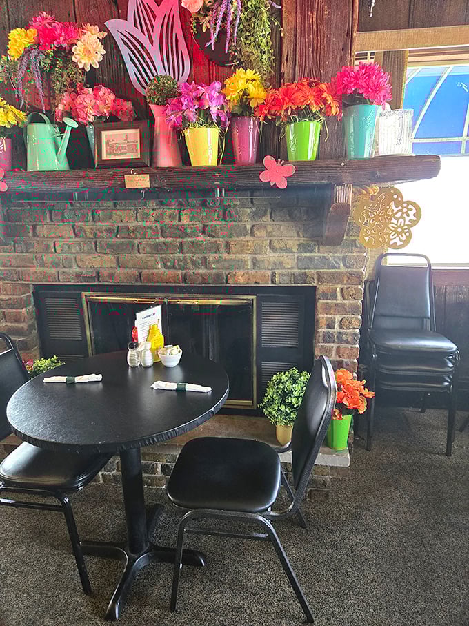 Cozy corner alert! This fireplace setup is begging for a long chat over coffee and coconut cake. Hygge, Midwest-style.
