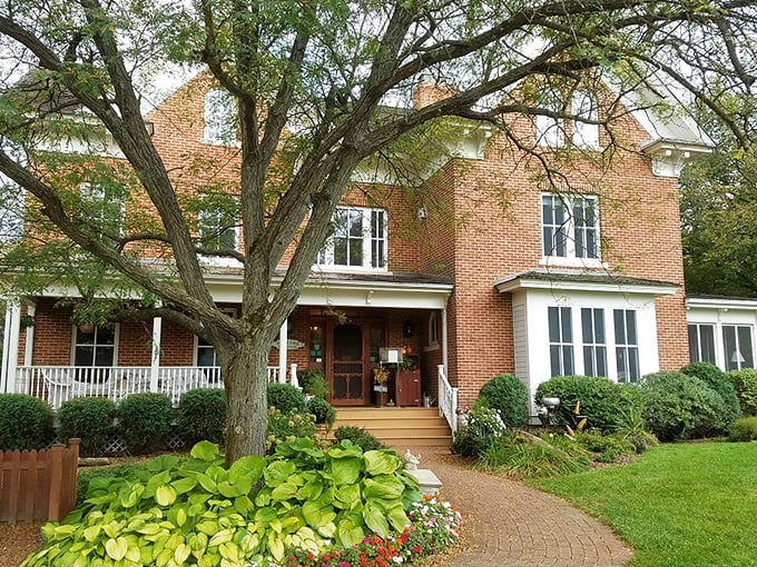 Curb appeal cranked up to eleven! This entrance is so inviting, you half expect woodland creatures to help with your luggage.