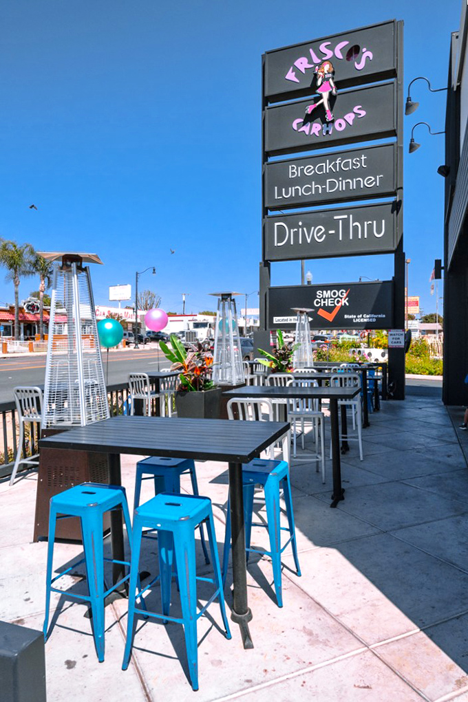 Al fresco dining with a side of retro charm. These outdoor seats are perfect for people-watching and pretending you're in a Coca-Cola commercial.