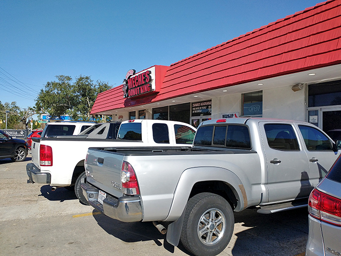 Pickup trucks and pickup orders! The parking lot tells a story of a town united by its love for circular breakfast treats.